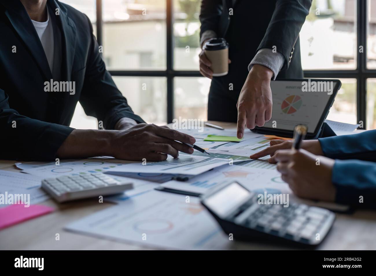 Analyst team in office analyzing financial data analysis for marketing ...