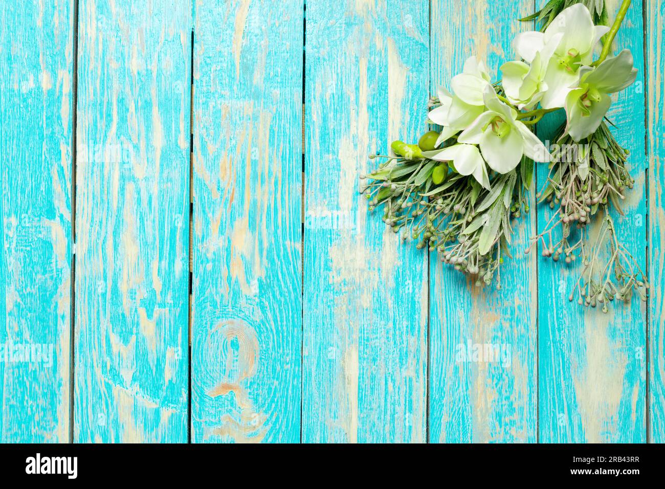 Beautiful fresh flower on wooden table, top view Stock Photo - Alamy