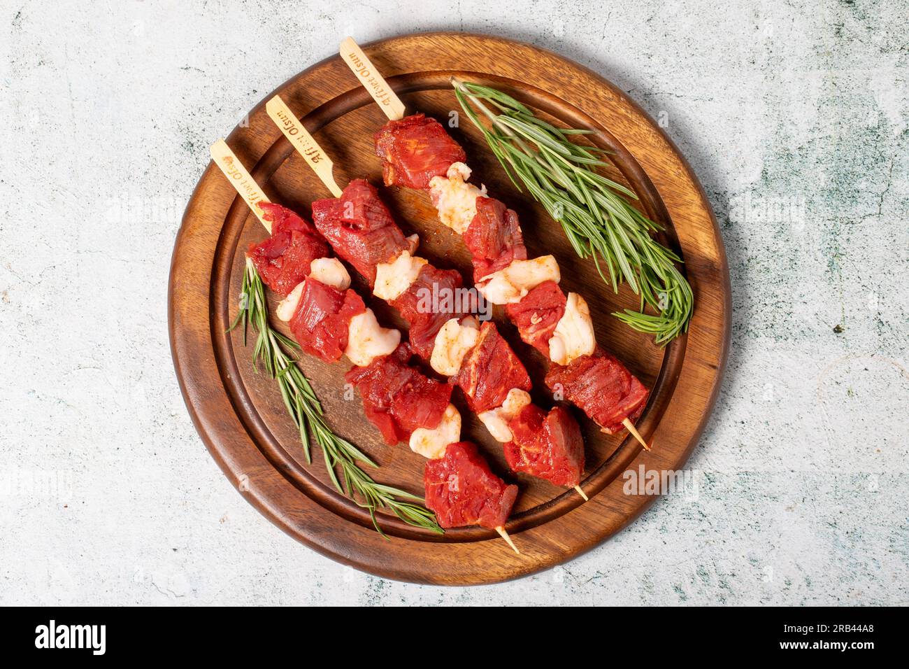Beef cubed skewer. Raw shish kebab on gray background. Turkish cuisine ...
