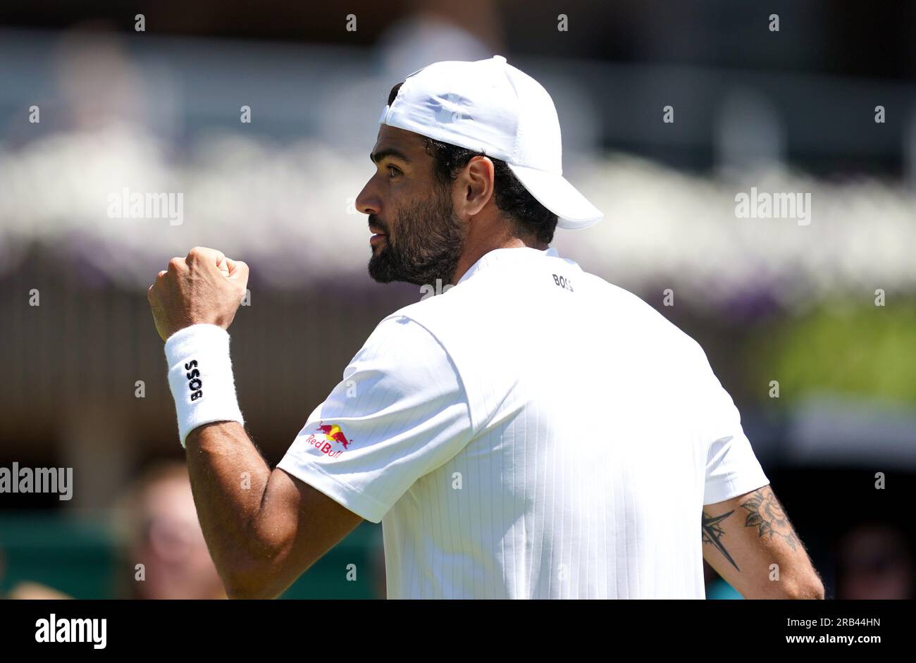 Matteo Berrettini reacts during his match against Alex De Minaur (not pictured) on day five of ...