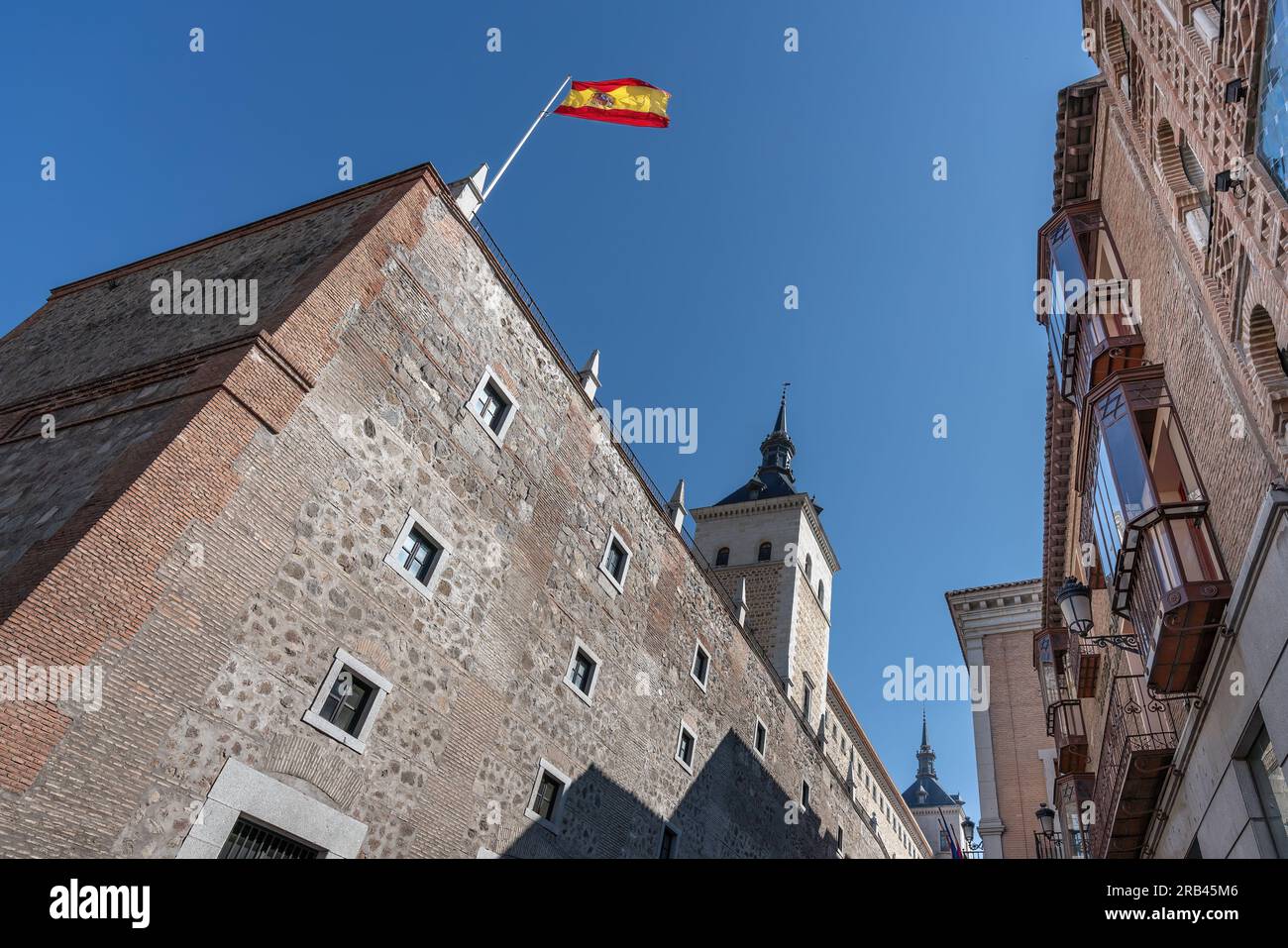 Alcazar of Toledo and Flag of Spain - Toledo, Spain Stock Photo - Alamy