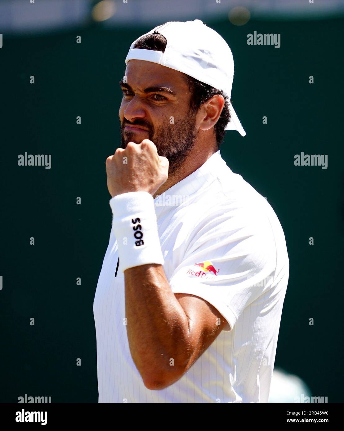 Matteo Berrettini reacts during his match against Alex De Minaur (not pictured) on day five of ...
