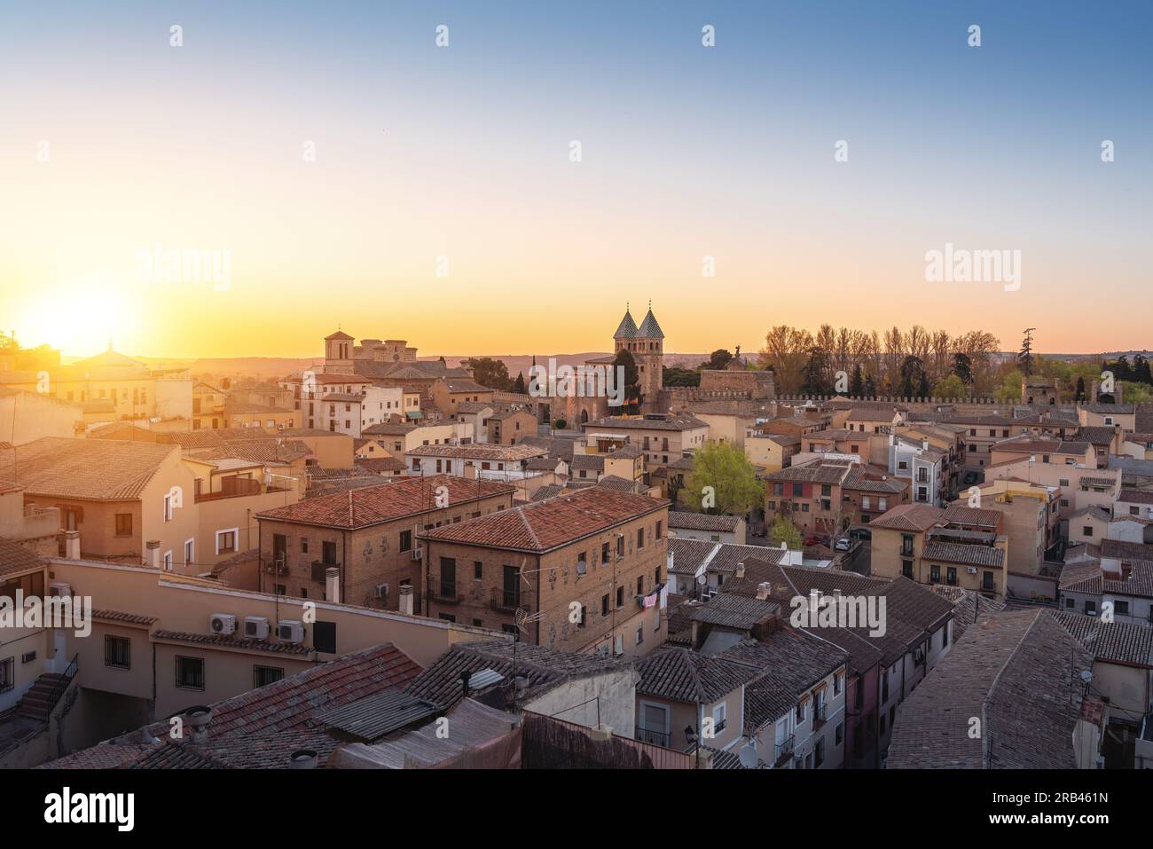 Toledo Skyline at sunset with Puerta de Bisagra Nueva Gate and Church ...