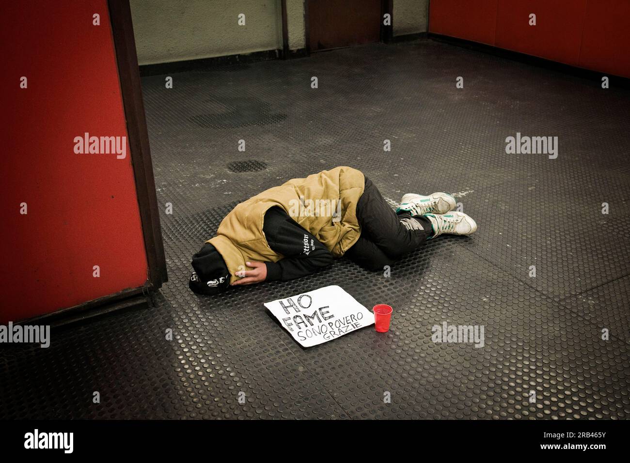 Social outcast, Milan, Italy Stock Photo - Alamy