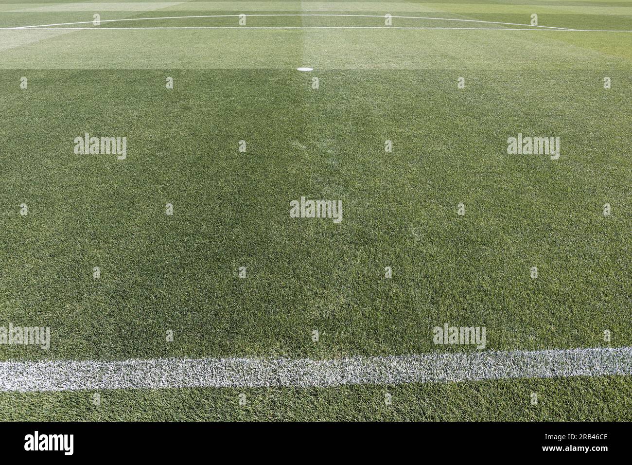 Natural grass field, seen from the area of one of the goals. Concept of ...