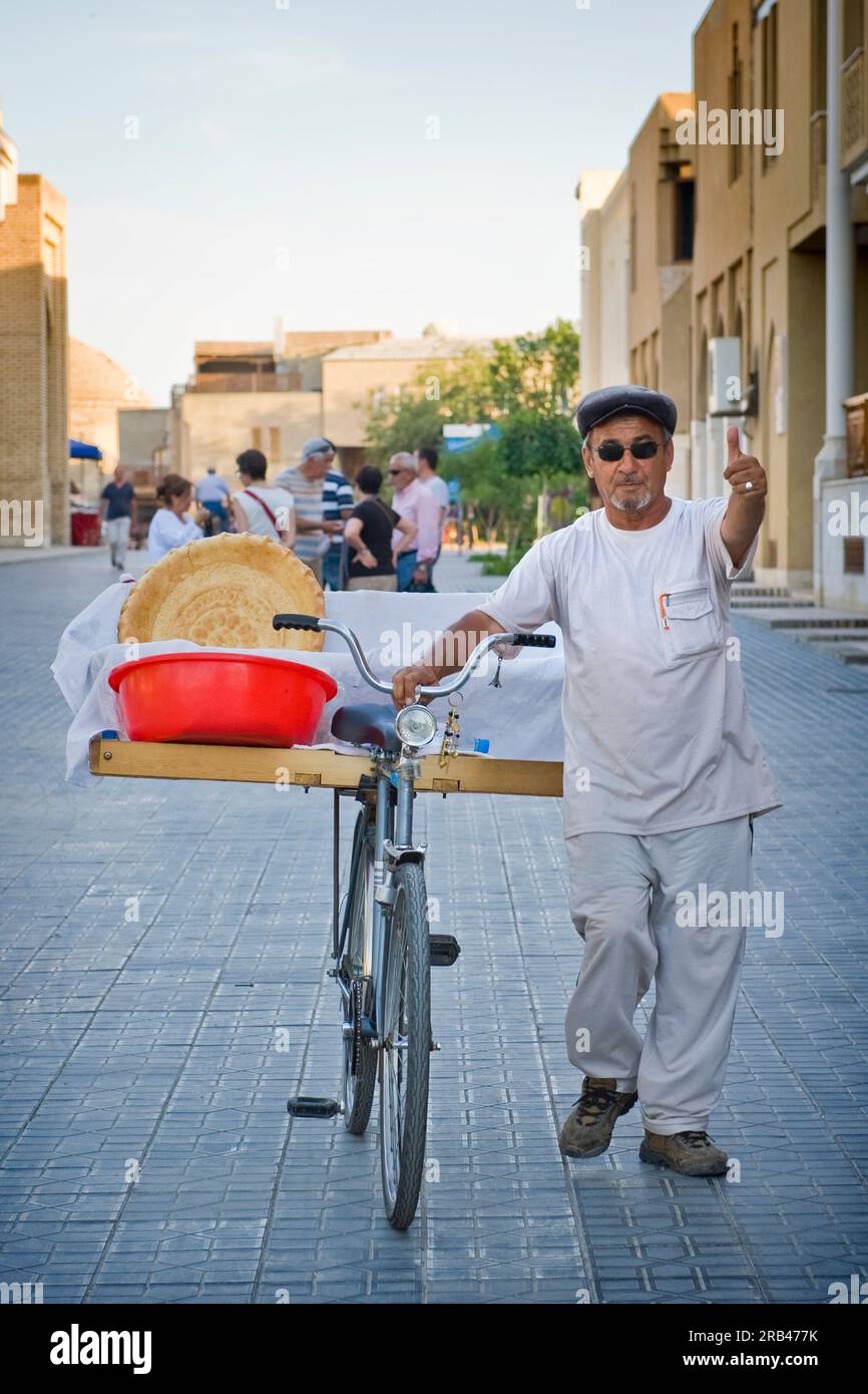 Uzbekistan, Bukhara, vendor of bread Stock Photo - Alamy