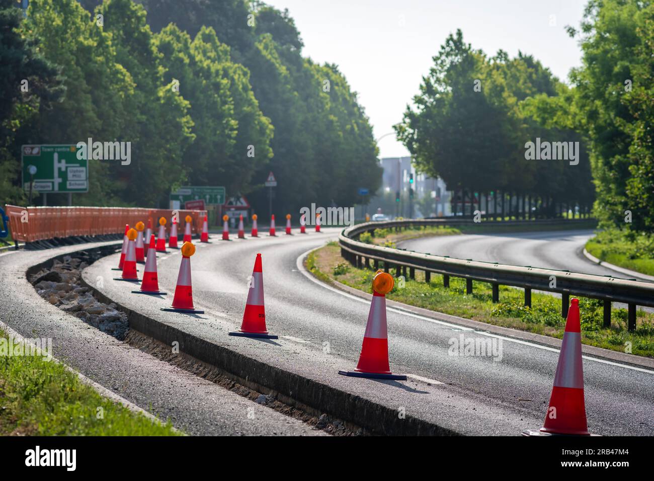 Roadworks cones on motorway in england uk Stock Photo - Alamy