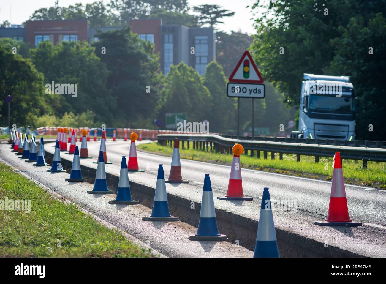 Roadworks cones on motorway in england uk Stock Photo - Alamy
