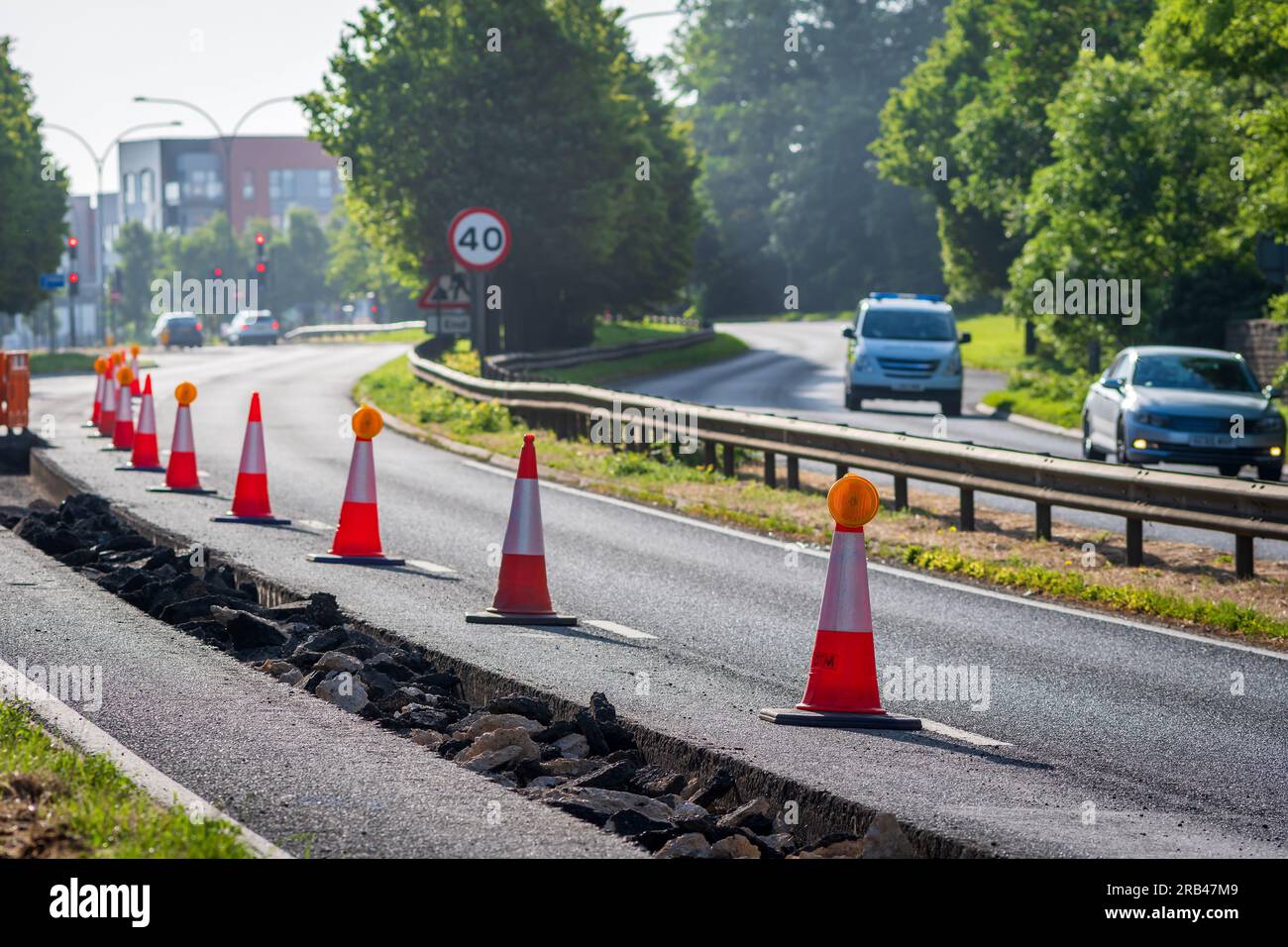 Roadworks cones on motorway in england uk Stock Photo - Alamy