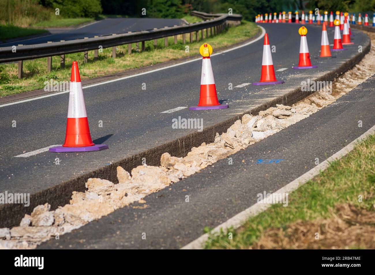 Roadworks cones on motorway in england uk Stock Photo - Alamy