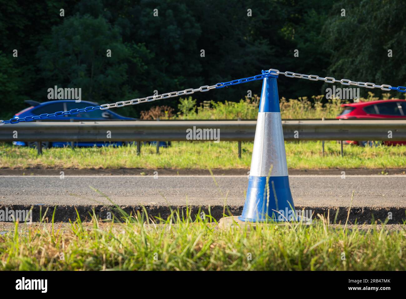 Roadworks cones on motorway in england uk Stock Photo - Alamy