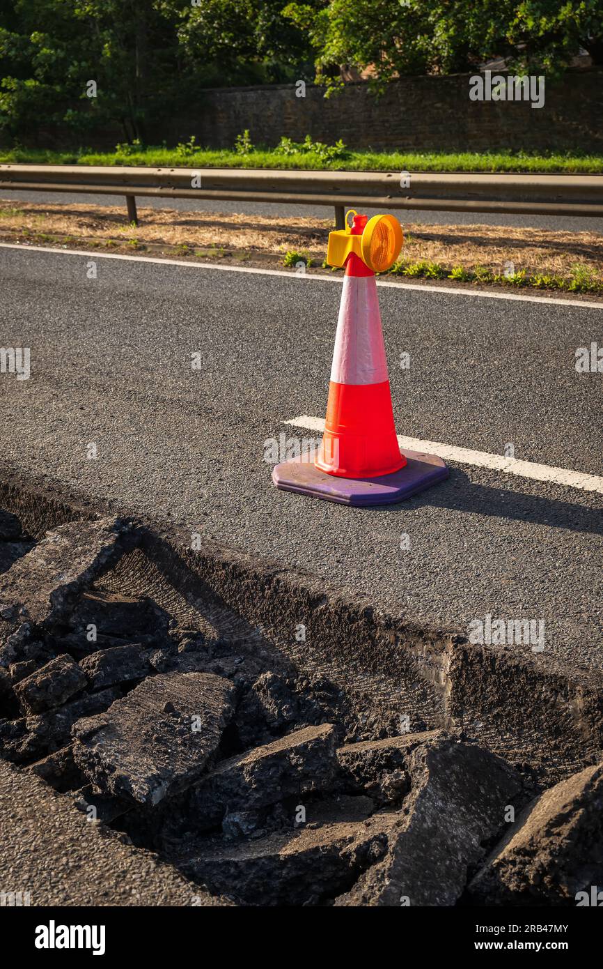 Roadworks cones on motorway in england uk Stock Photo - Alamy