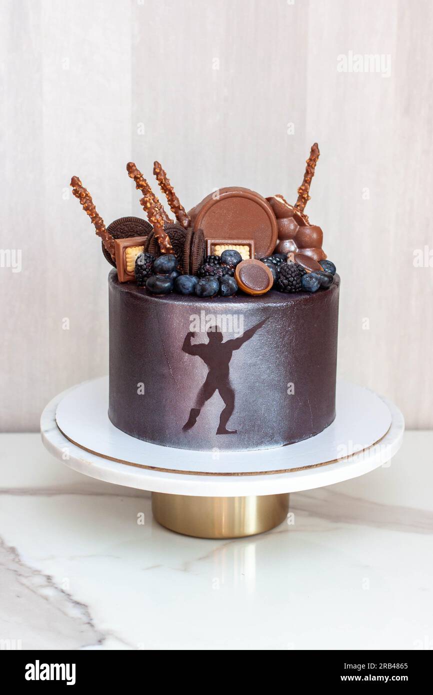 The idea of a birthday cake for a bodybuilder, athlete, power lifter or ...