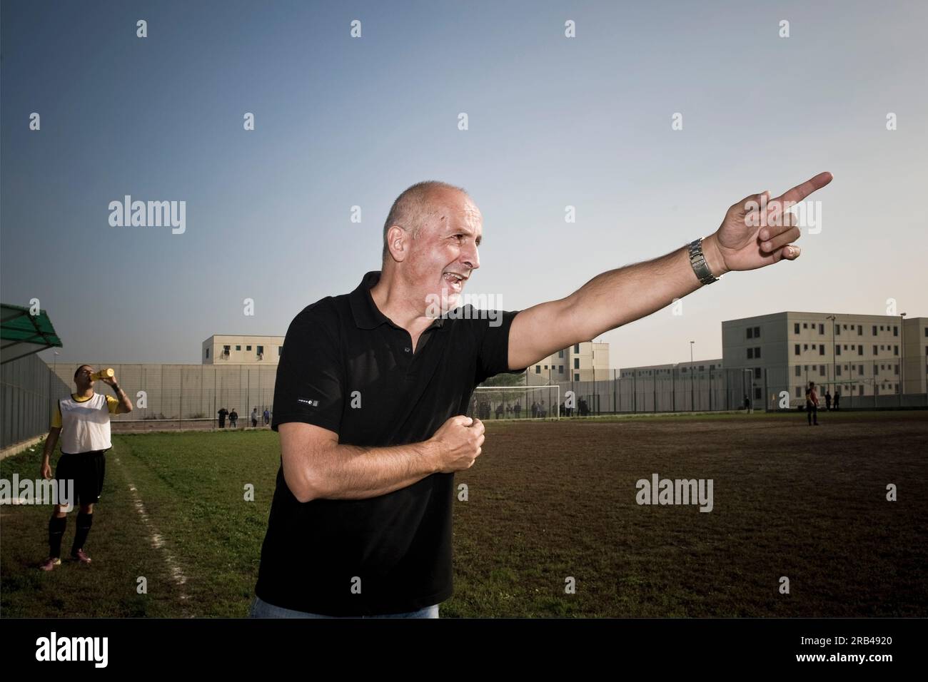 Italy, Bollate prison, football game inside the prison, the coach ...