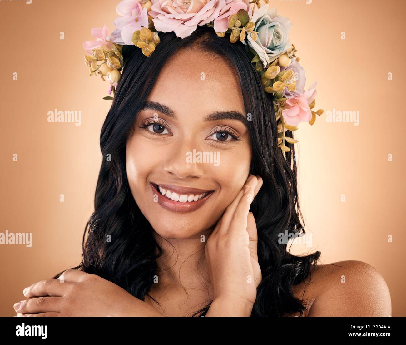 Portrait, skincare and flower crown with a model woman in studio on a ...