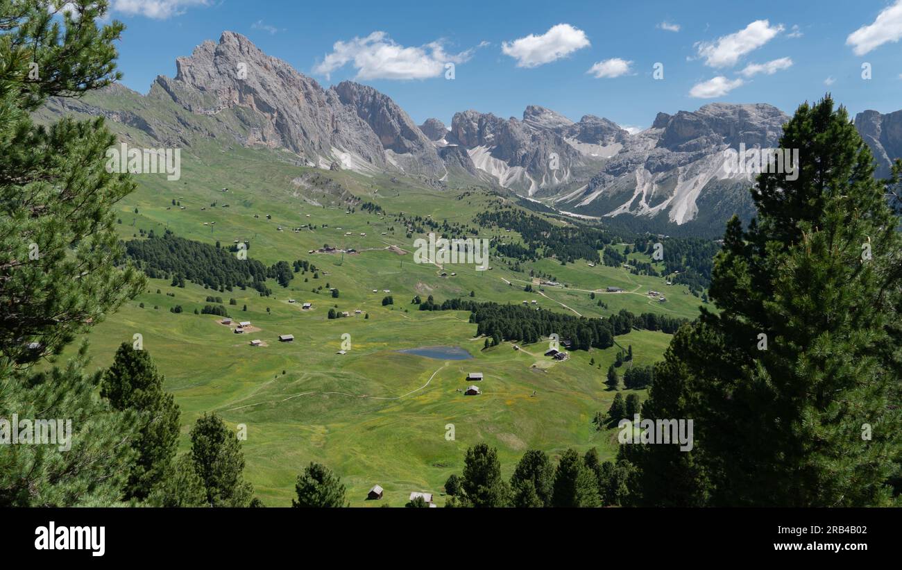Green hilly meadows in the Geislerspitzen mountains (Gruppo delle Odle ...