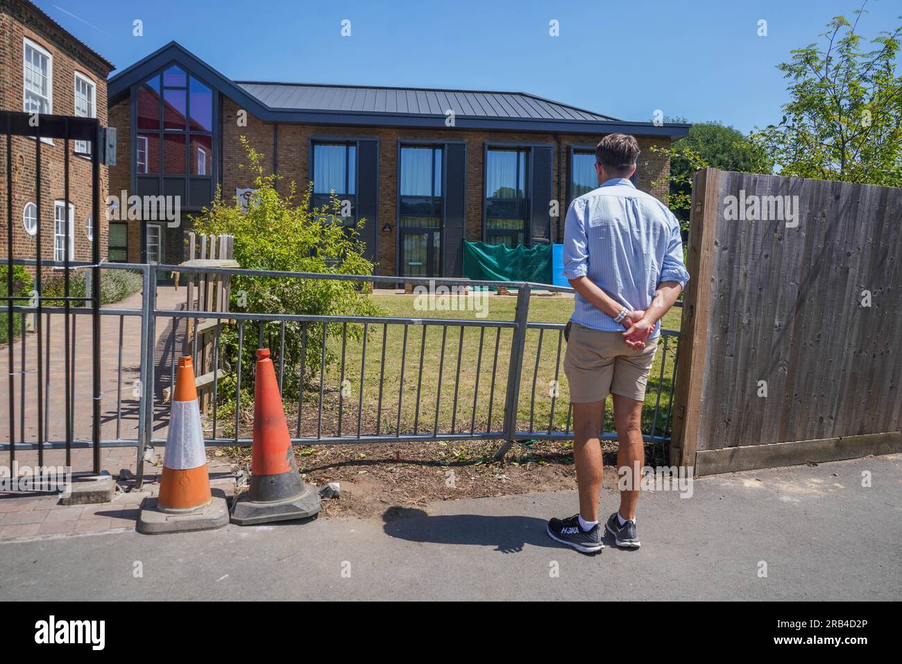 London UK. 7 July 2023 . A man views the crash scene at The Wilberforce ...