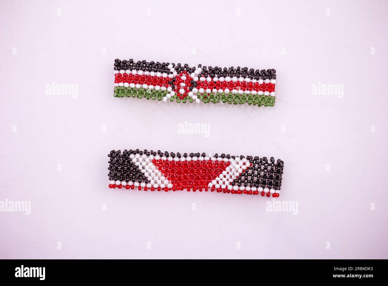 Kenyan Flag colors Bracelets on the white table Stock Photo - Alamy