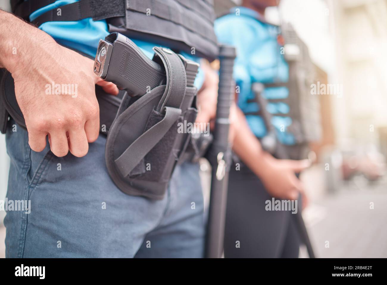 Man, hands and police with gun in holster to protect and serve in city ...