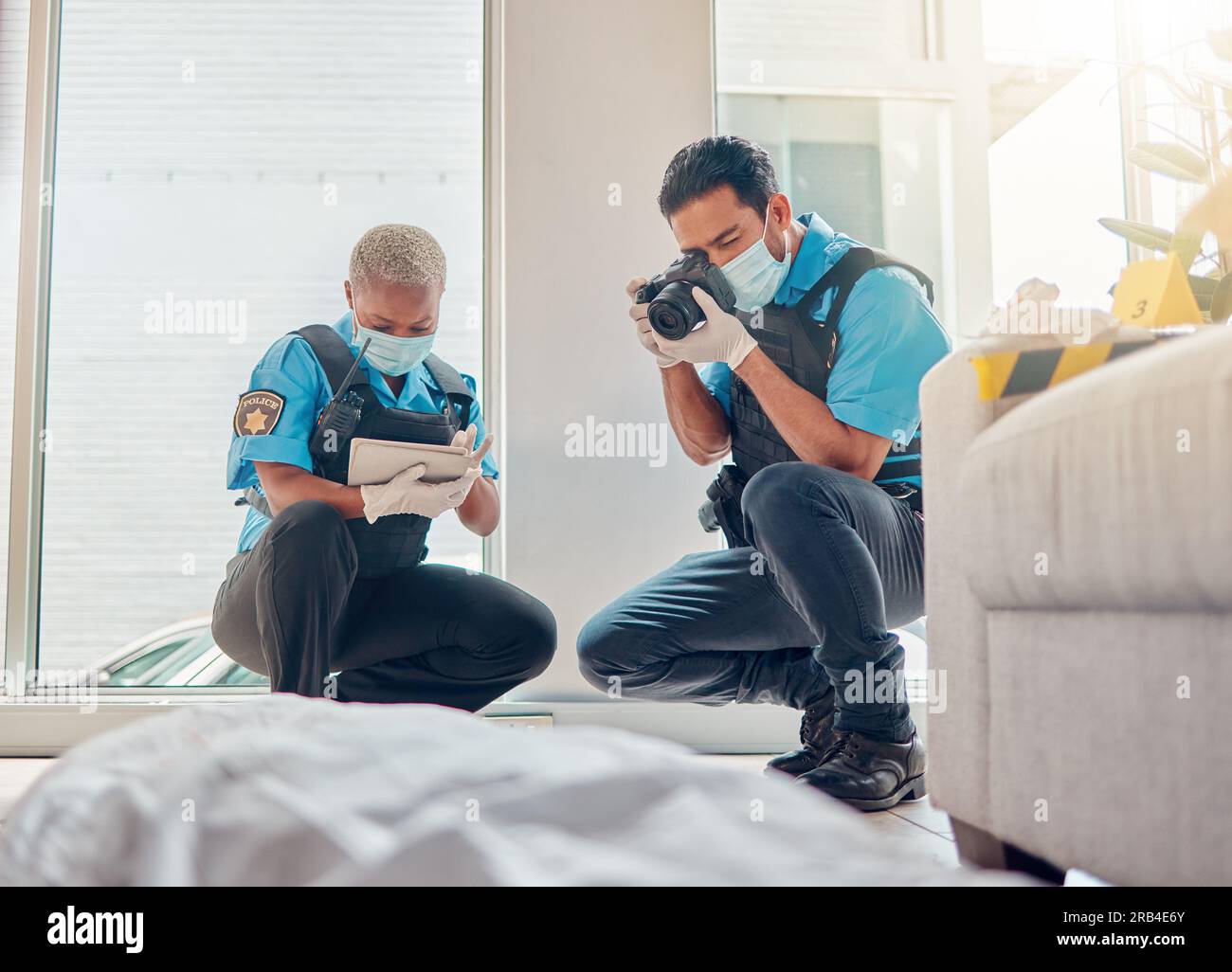 People, police and investigation at the crime scene for murder, victim ...