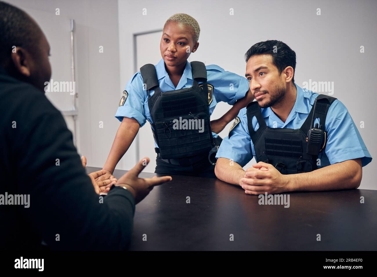 Interrogation Investigation And Police Team With A Suspect For Questions As Law Enforcement