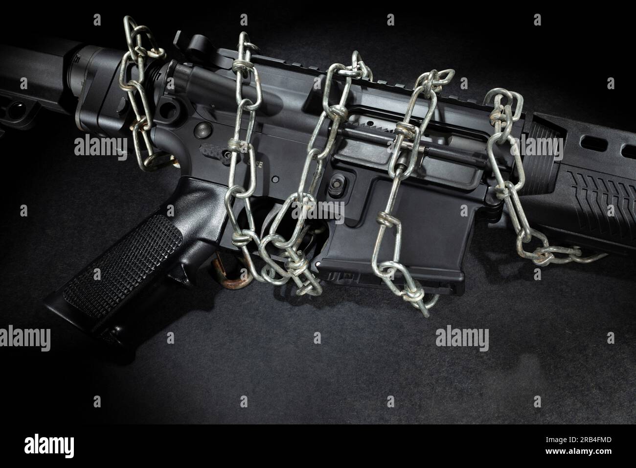 Assault rifles bound in chains due to gun control legislation Stock ...