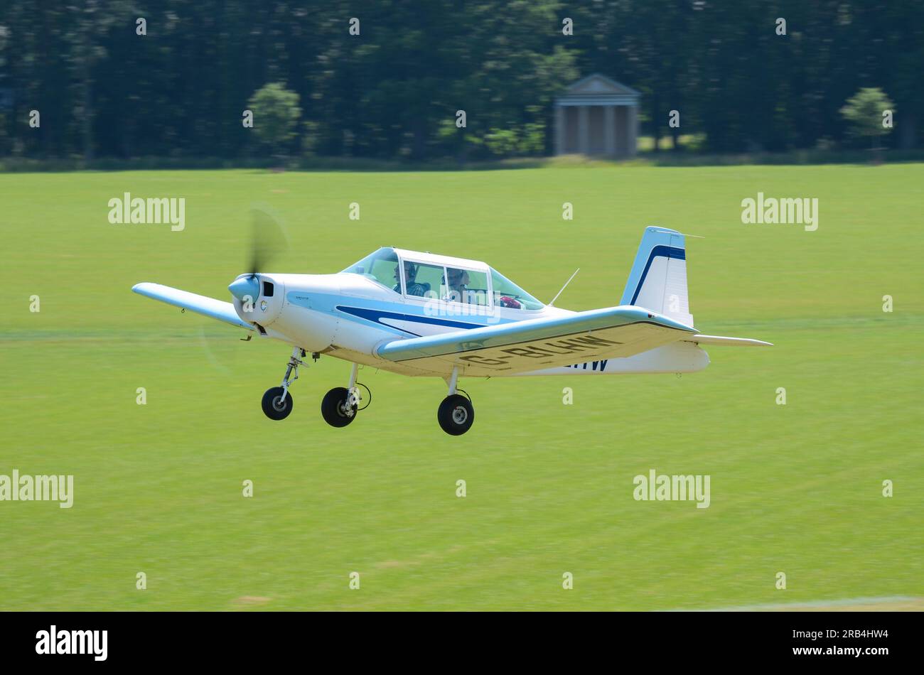 Varga 2150A Kachina taking off from the grass airstrip at a wings and ...