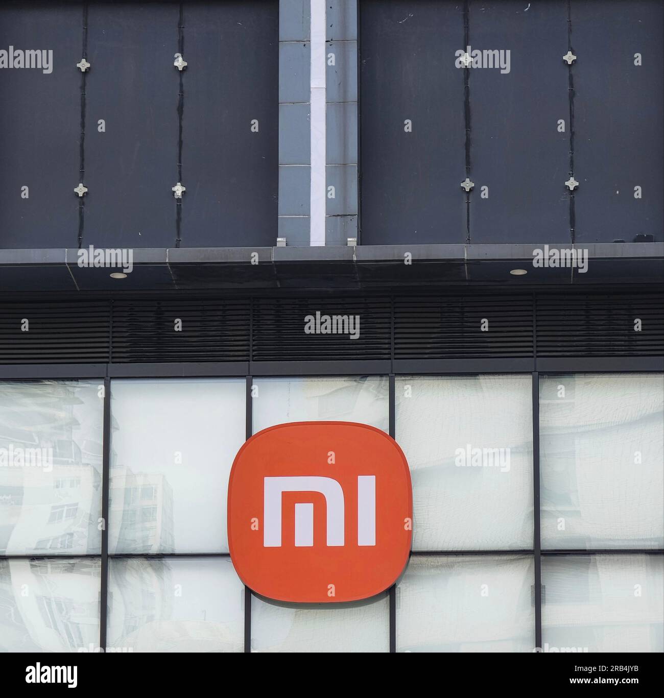 Xiaomi logo on retail store window facade at Xujiahui, Shanghai, China Stock Photo - Alamy