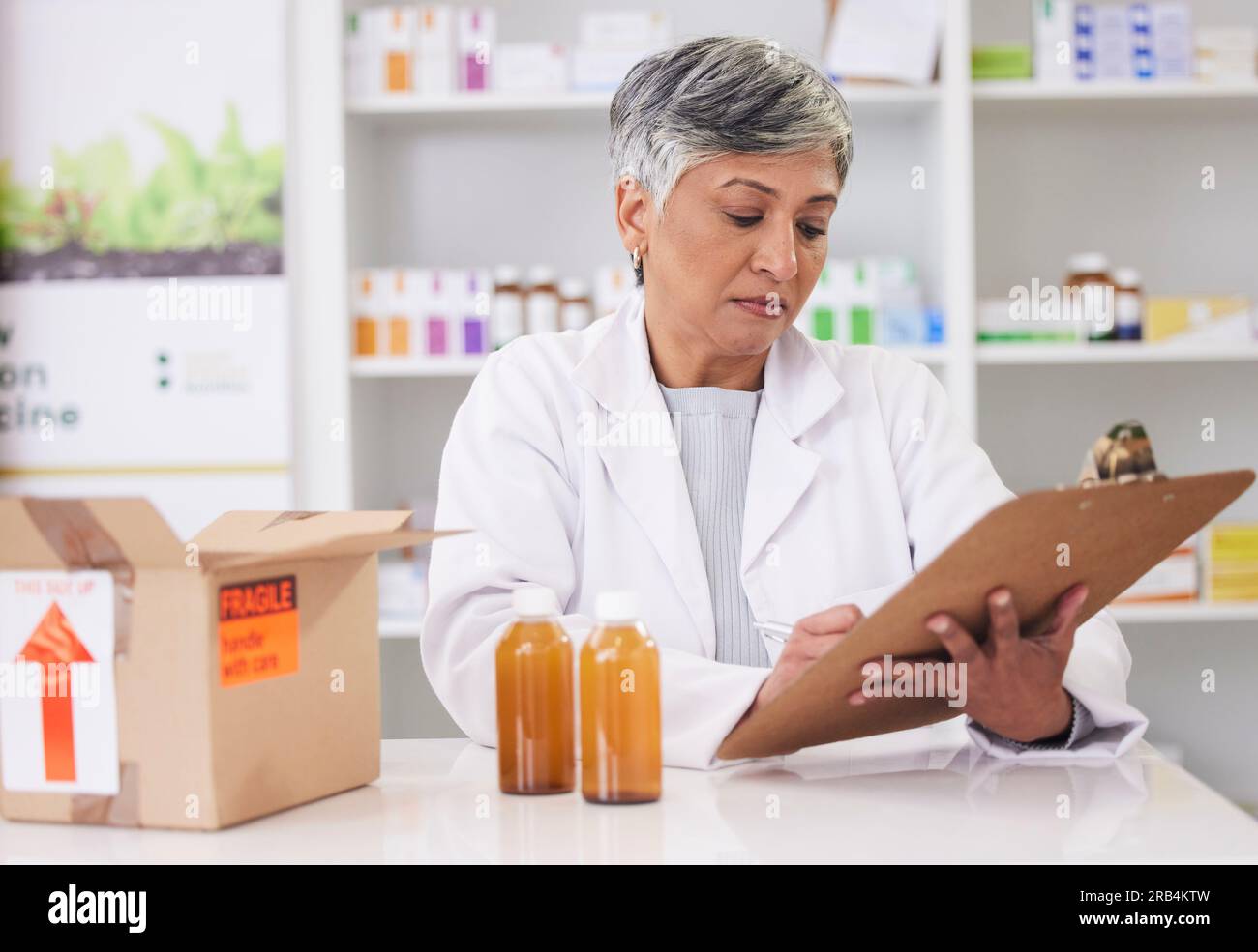 Woman, doctor and clipboard at pharmacy for inventory inspection ...