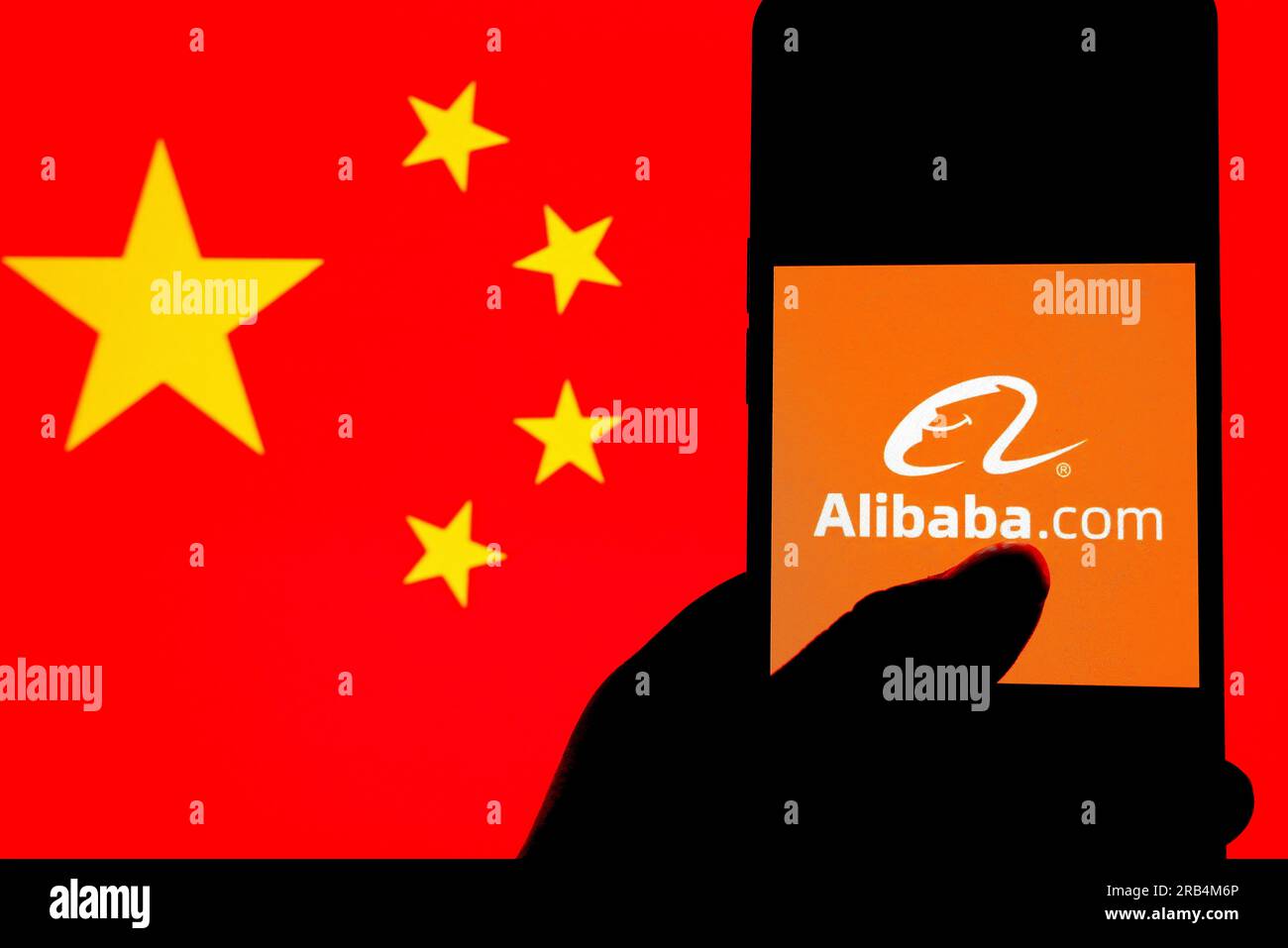 In this photo illustration, an Alibaba.com logo is seen displayed on a ...
