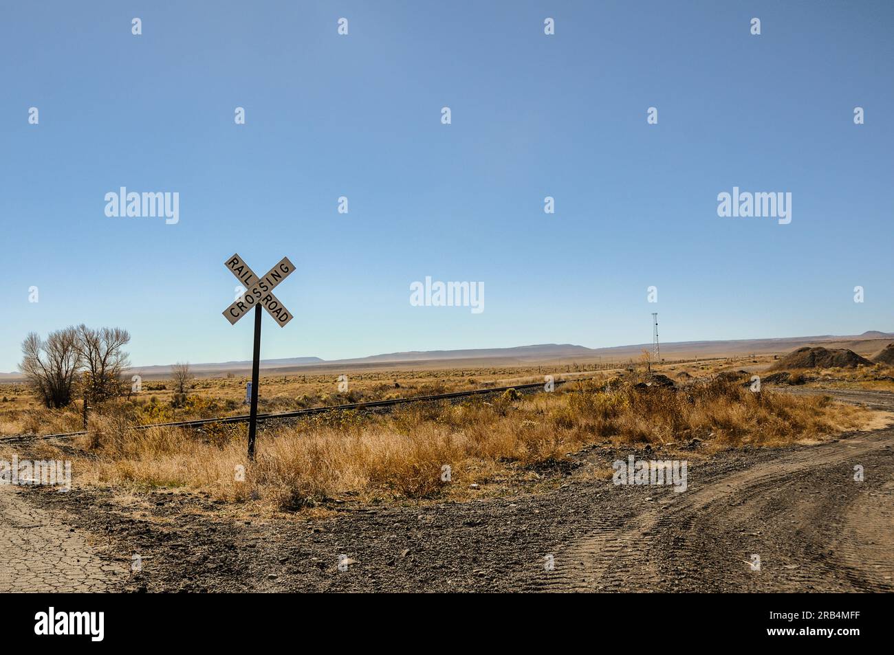 Rail road crossing sign in the New Mexico desert Stock Photo - Alamy