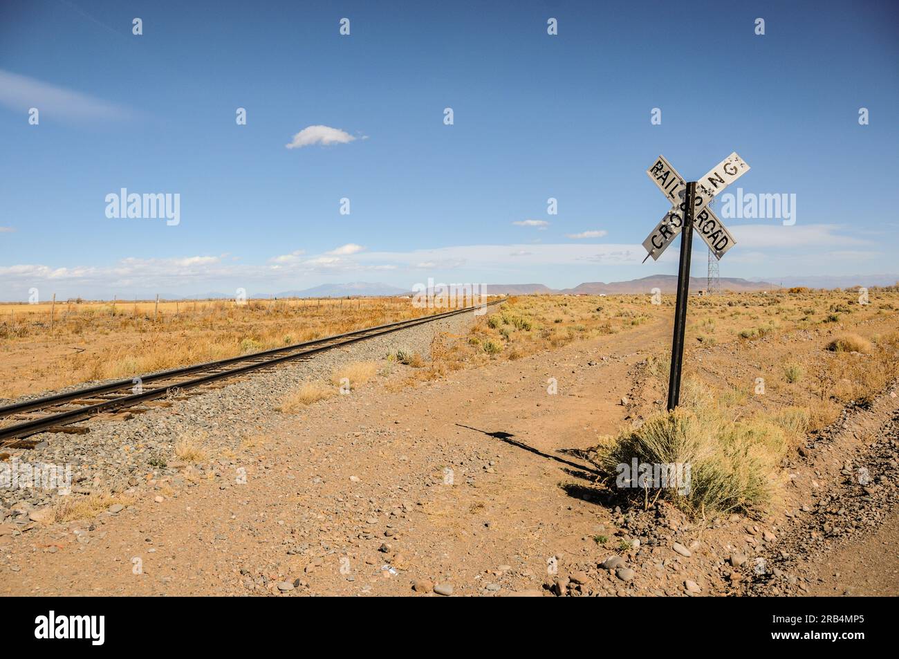 Rail road crossing sign in the New Mexico desert Stock Photo - Alamy