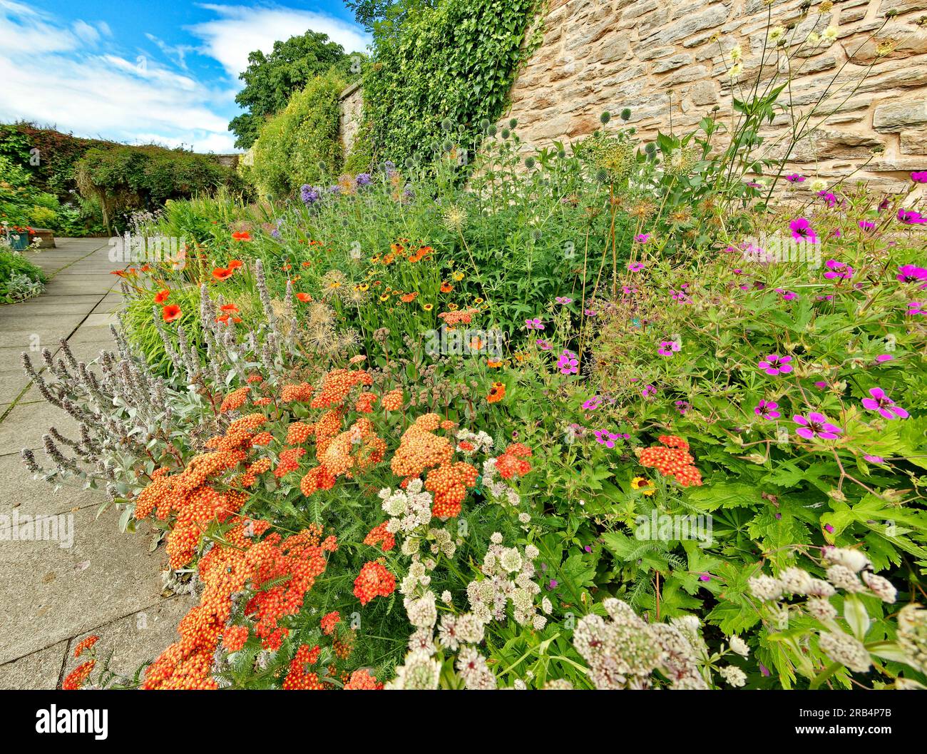 Inverness Botanic Gardens Scotland stone wall and a very colourful ...