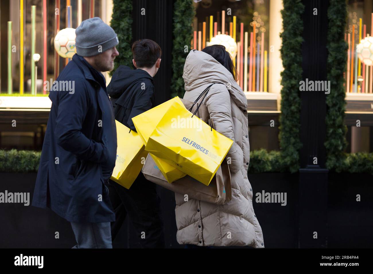 Shoppers walk in central London Stock Photo - Alamy