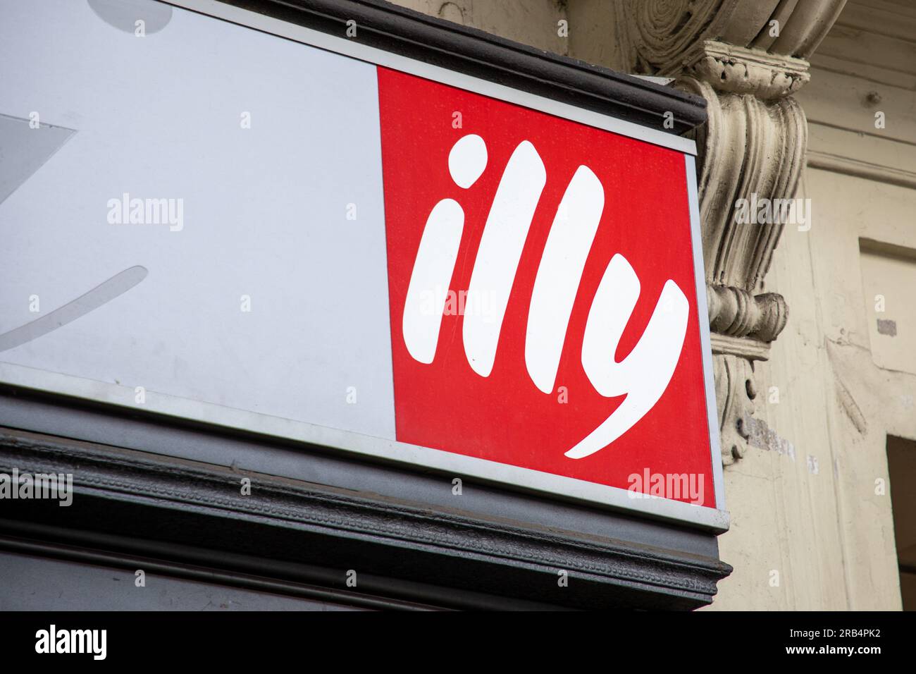 Milan , Italy - 07 05 2023 : Illy coffee shop red sign logo cafe leading Italian coffee makers ...