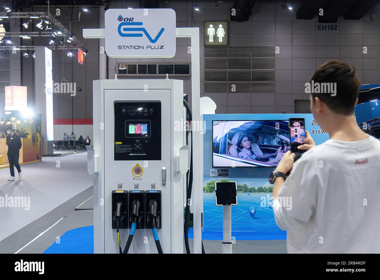Bangkok, Thailand. 07th July, 2023. A visitor seen taking a photo of the charging station of EV ...