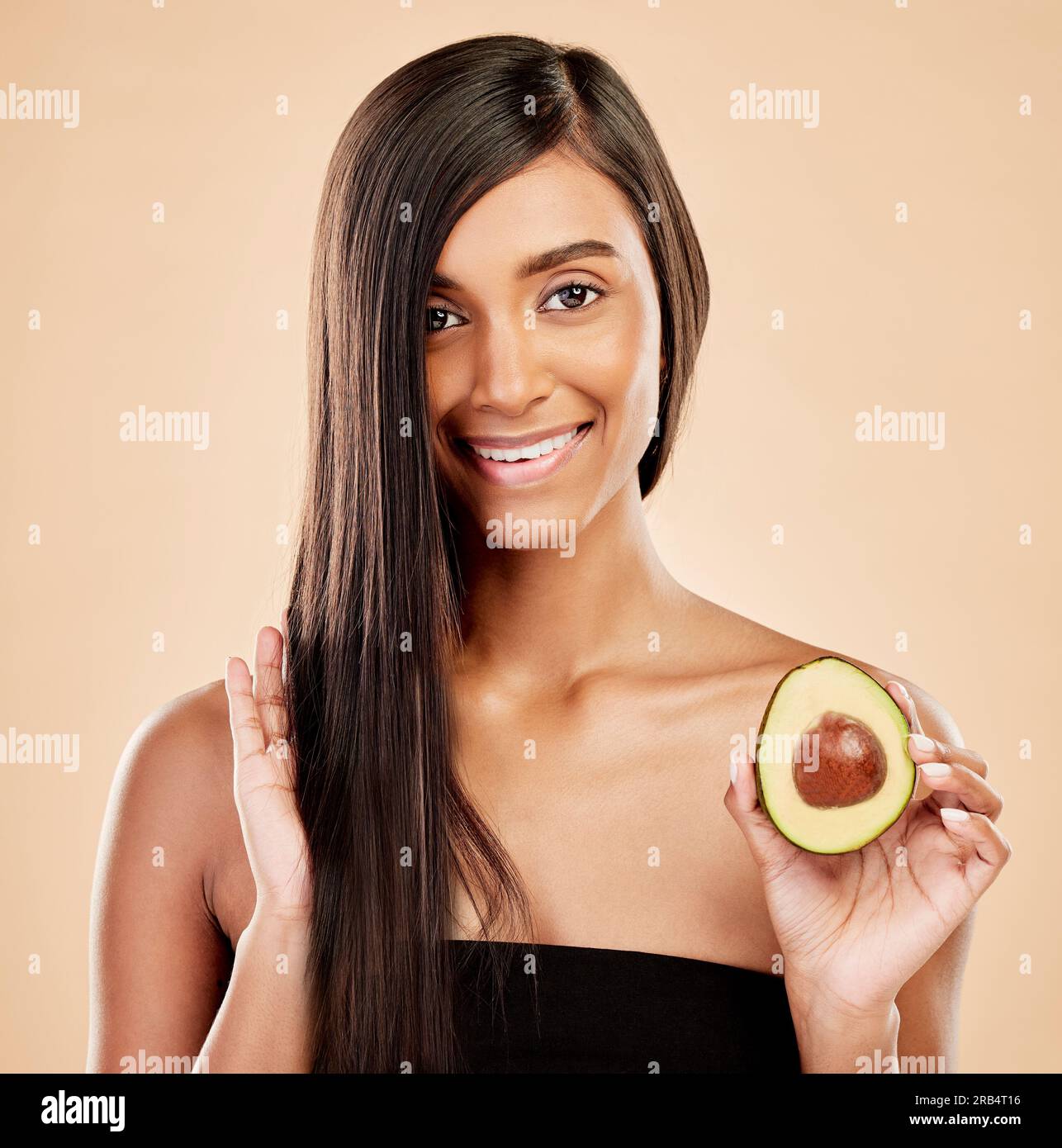 Portrait, woman and avocado for hair, beauty or cosmetic treatment of ...