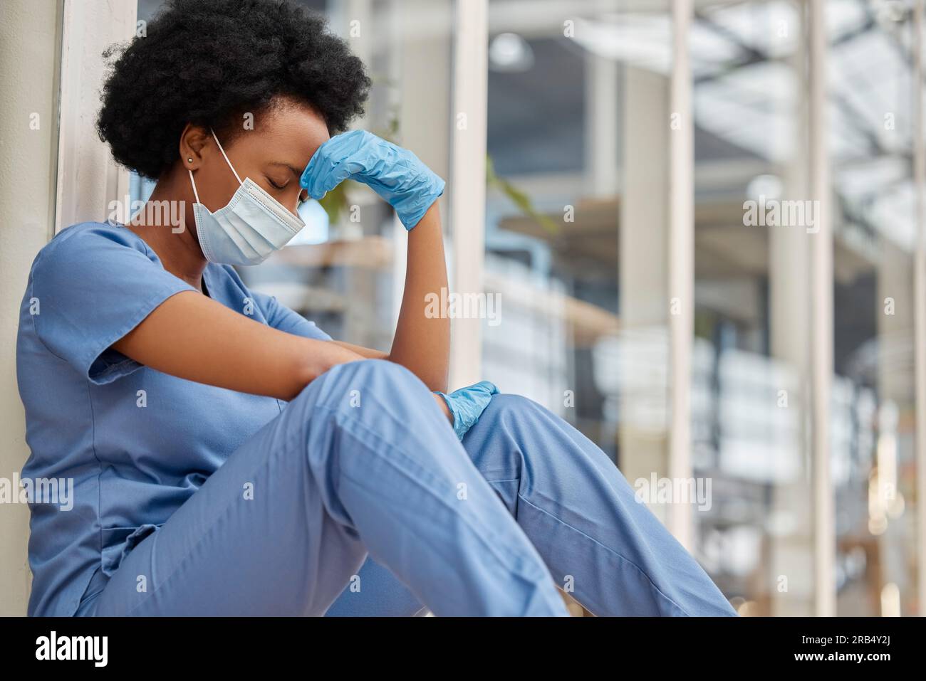 Sad surgeon, crying and black woman depressed about clinic news, mental ...