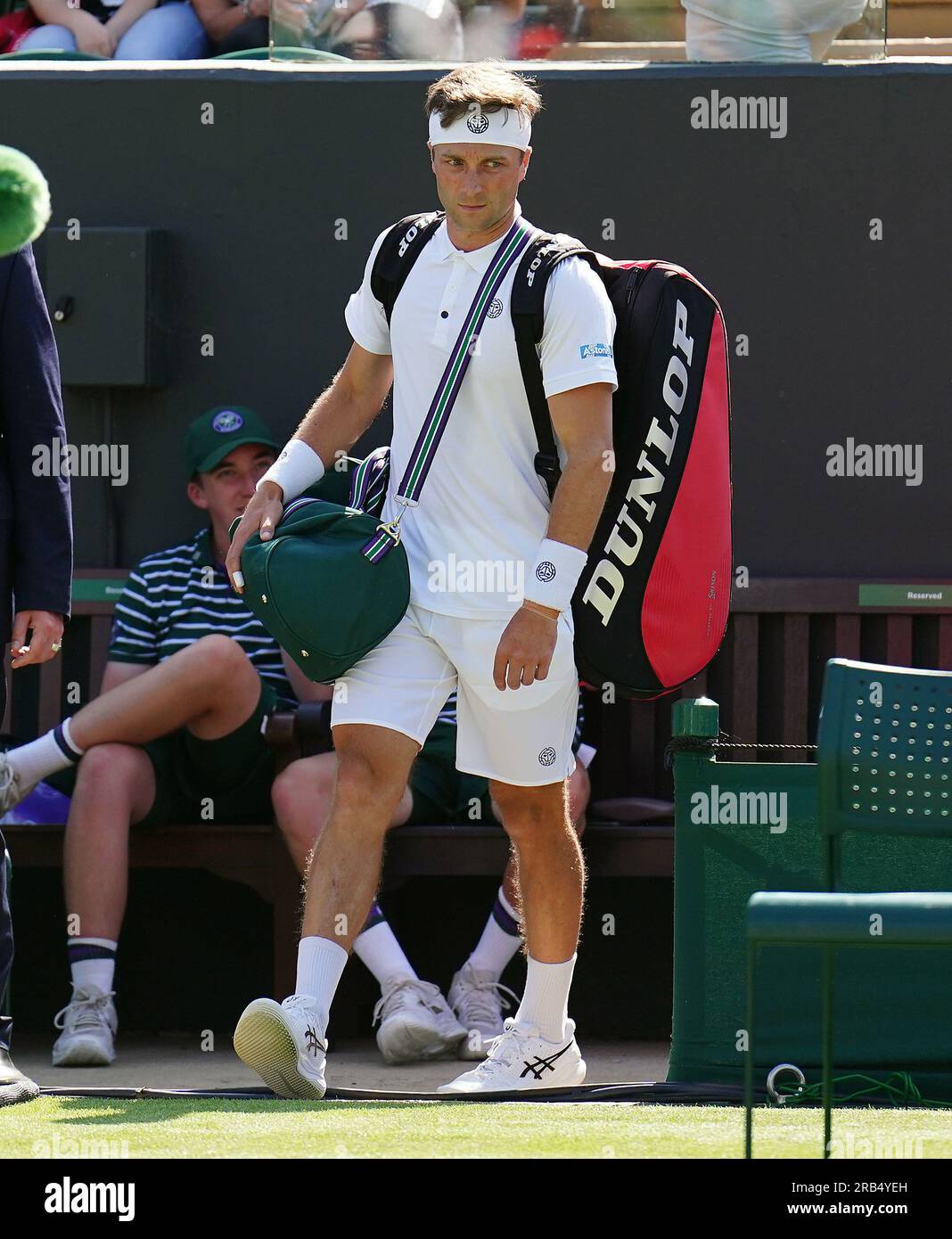 Liam Broady walks on to court for his match against Denis Shapovalov ...
