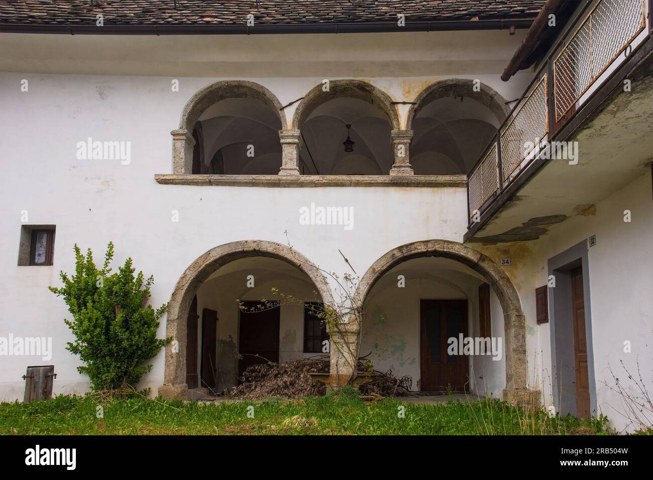 Ovaro, Italy - April 8th 2023. An old and now disused residential ...