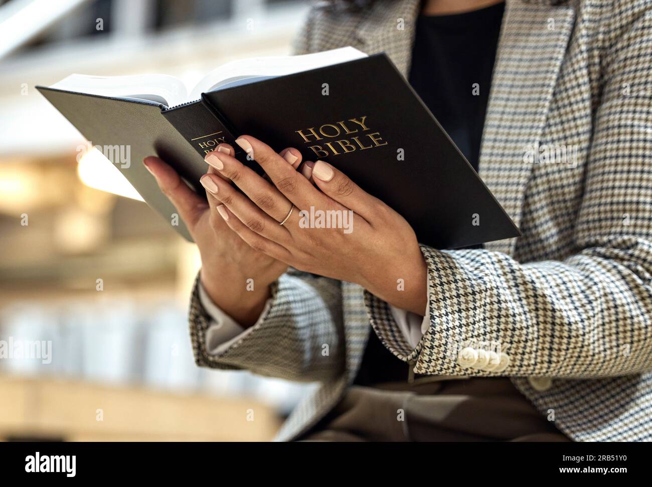 Hands, bible and person with reading, religion and faith with knowledge ...
