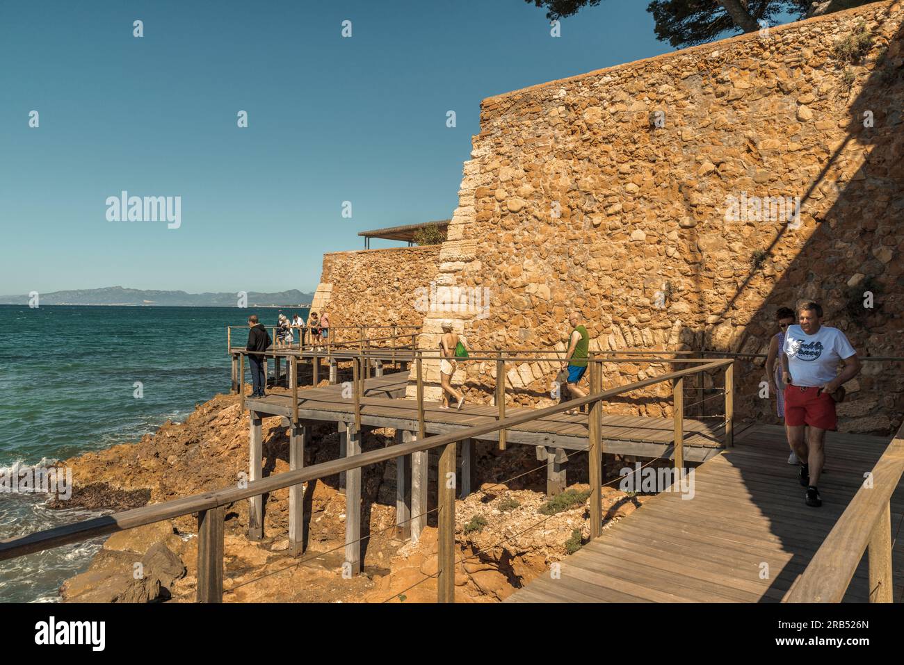 Winding coastal road that passes through the coves and beaches between ...