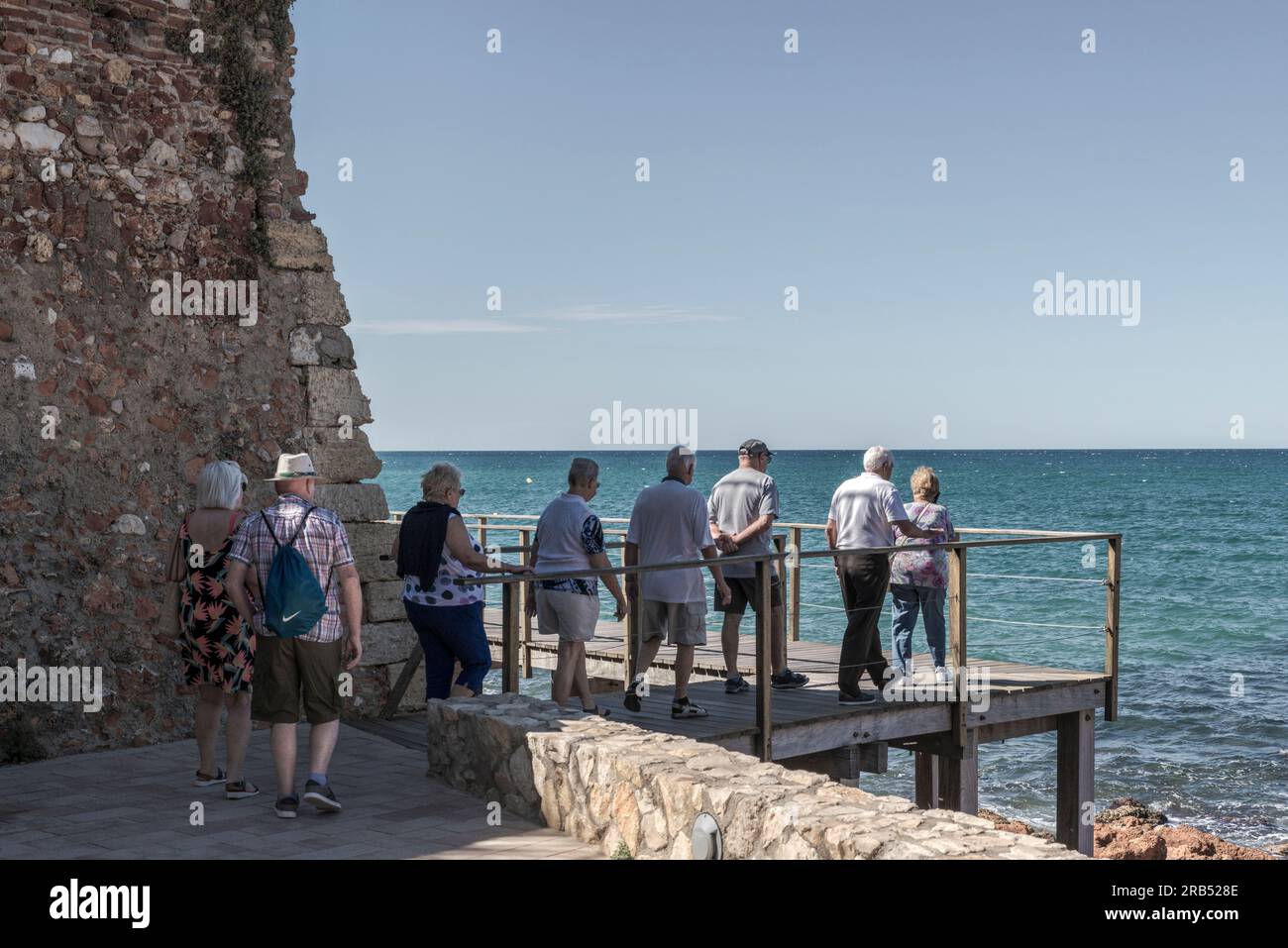 Winding coastal road that passes through the coves and beaches between ...