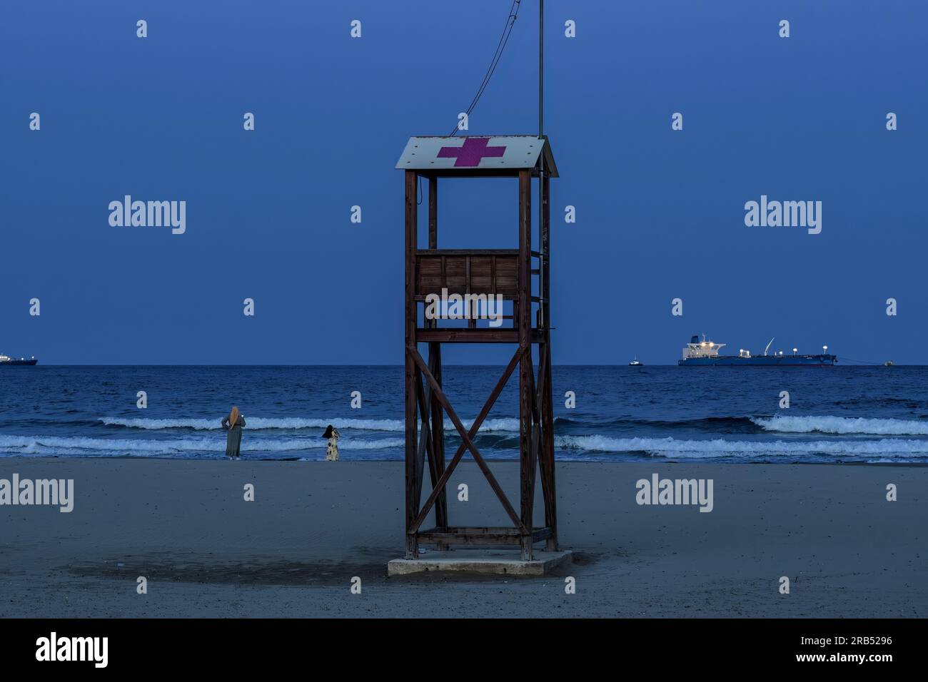 night view of the promenade of the beach in La Pineda, a district of ...