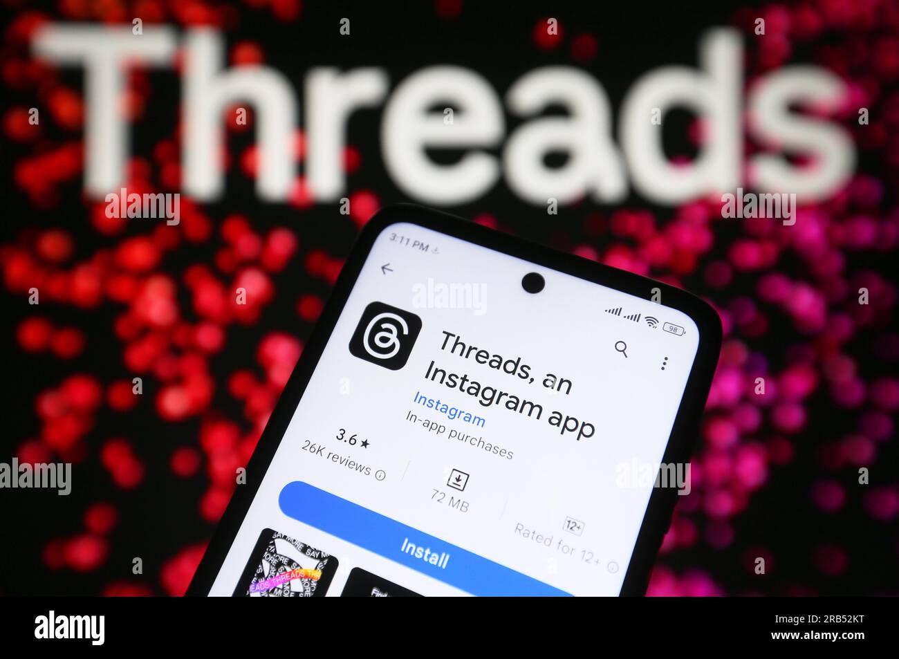 In this photo illustration, a Threads app logo seen displayed on a ...