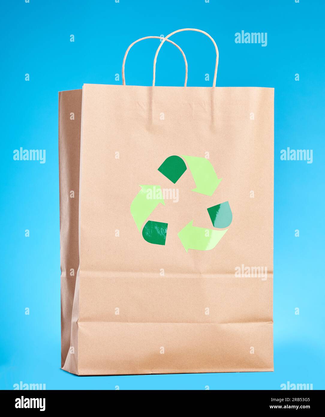 Brown paper bag, recycling sign and studio for sustainability, shopping ...