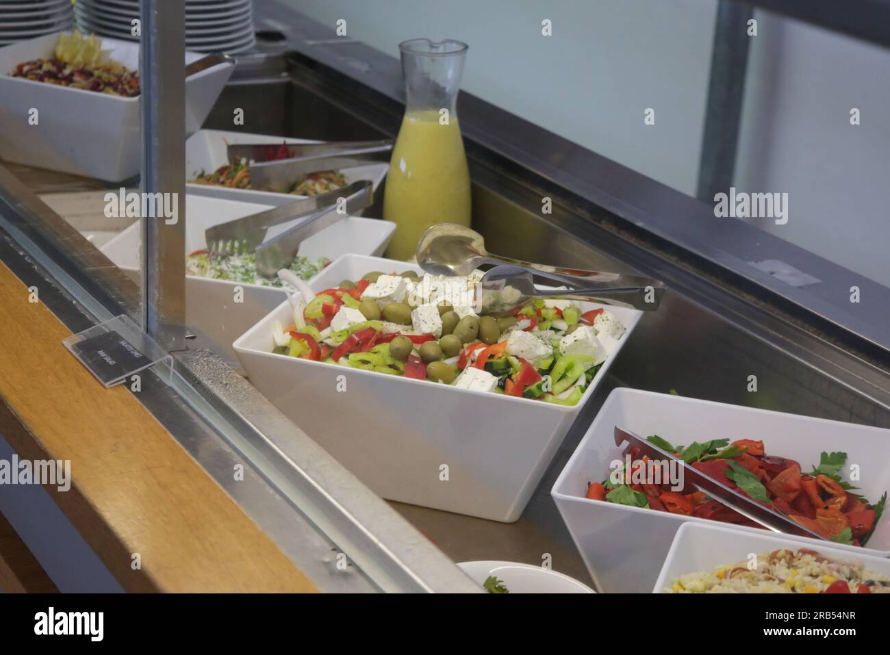 Various food served on a buffet line Stock Photo - Alamy