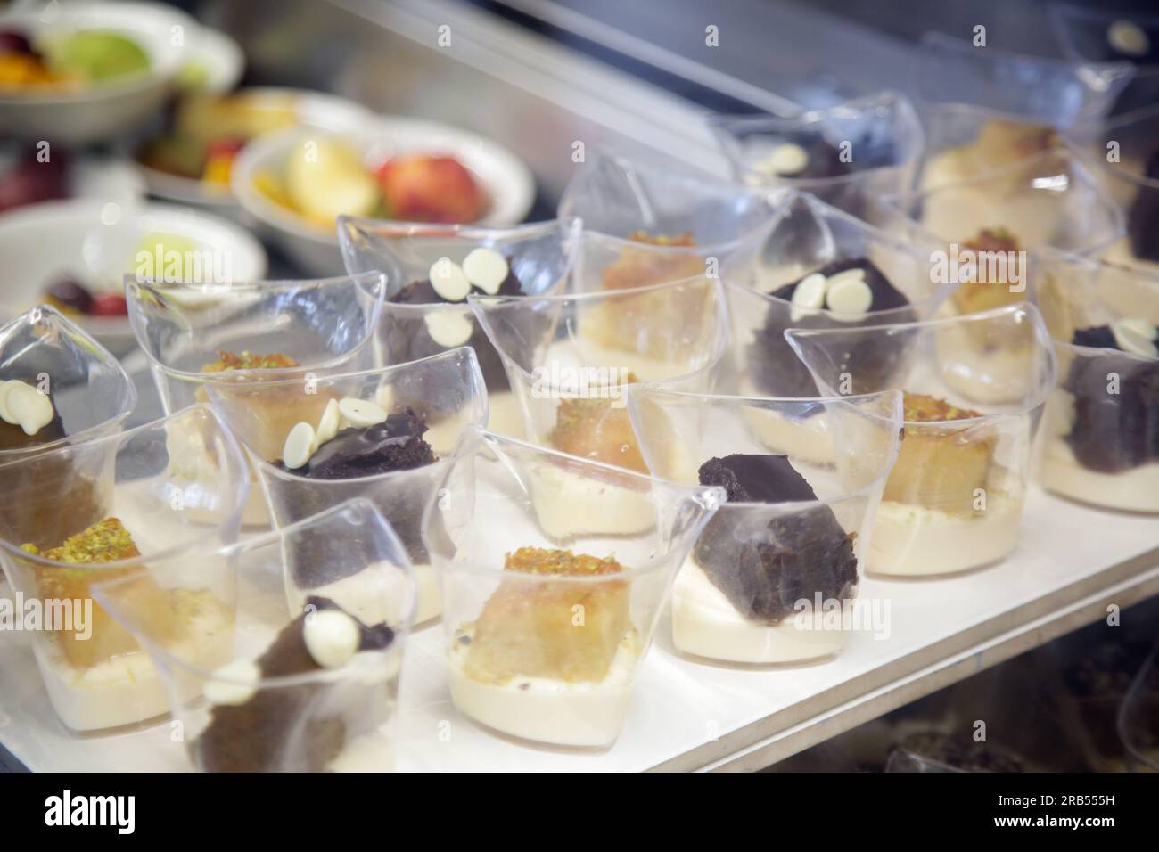 Various desserts served in a buffet line Stock Photo - Alamy