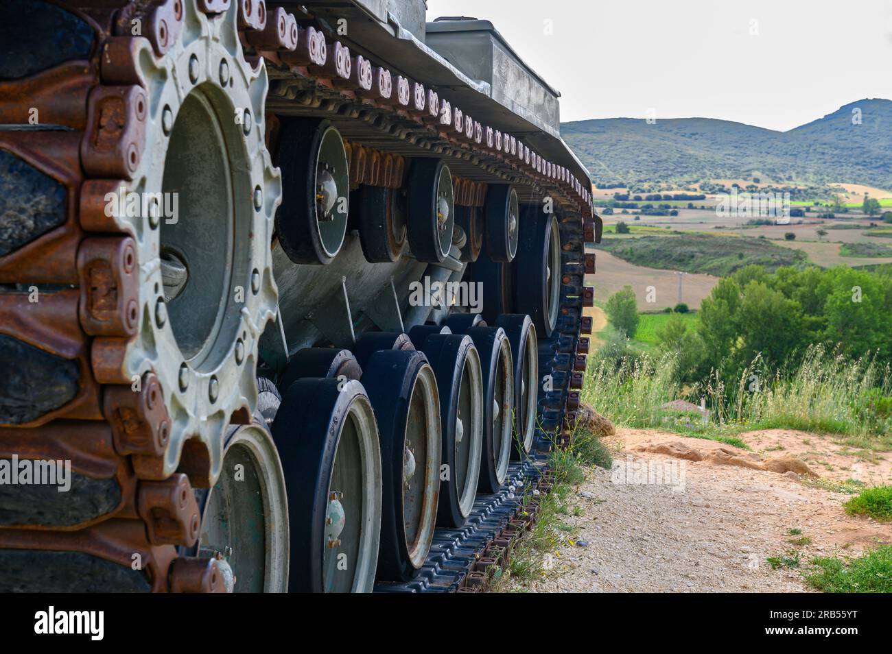 Close-up of the caterpillar, of the chains and traction wheels of an ...