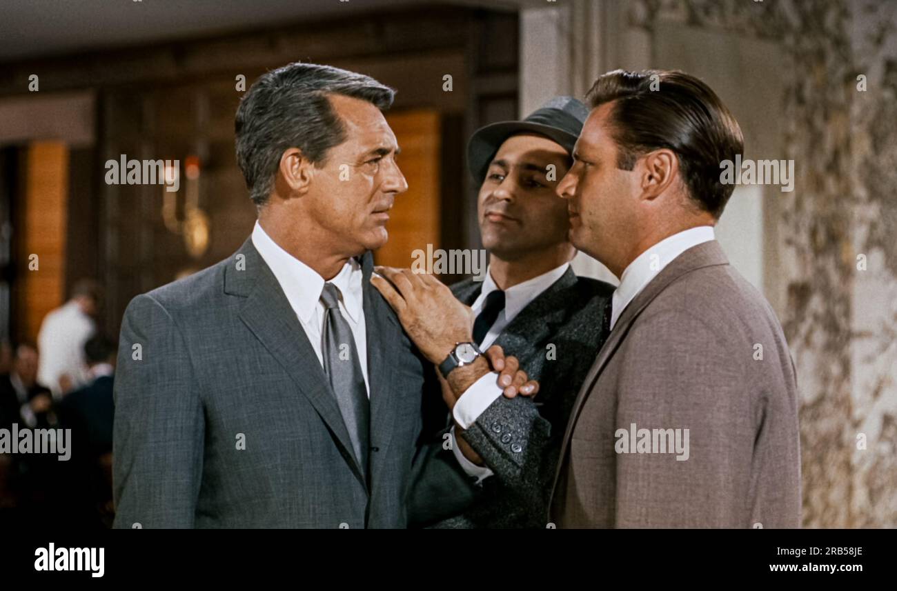USA. Cary Grant, Robert Ellenstein and Adam Williams in a scene from ...